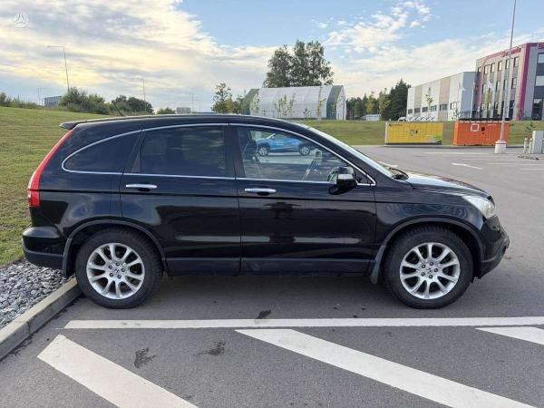Melns Honda CR-V 2007 Viļņa, ar dzinēja tilpumu 2.20 L un nobraukumu 320 tūkst. km par 4400 €, foto 6 vietnē AUTOMOTO.COM.LV