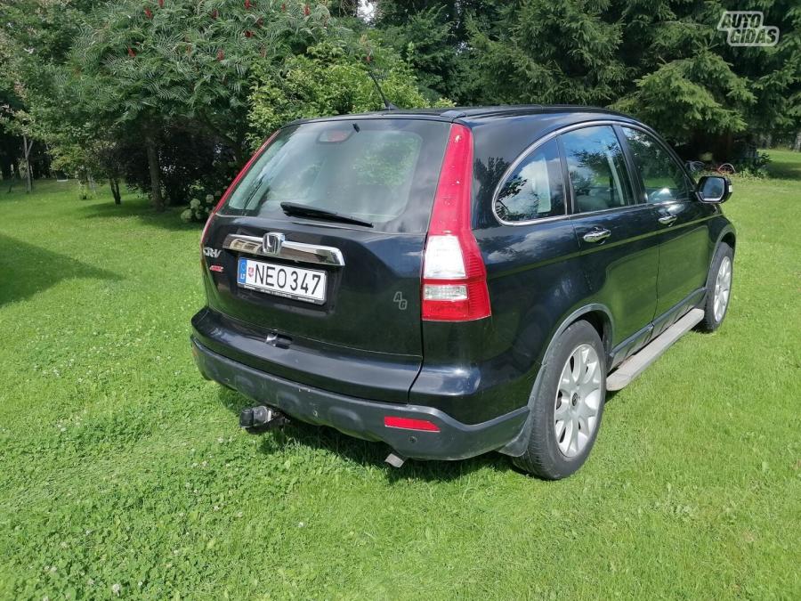 Black Honda CR-V 2007 in Moletai, with an engine capacity of 2.20 L and mileage of 379 thousand km for 3150 €, photo 7 on AUTOMOTO.COM.LV