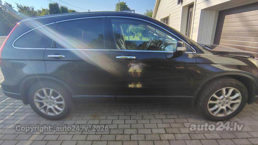 Melns Honda CR-V 2007 Valga, ar dzinēja tilpumu 2.20 L un nobraukumu 330 tūkst. km par 3000 €, foto 3 vietnē AUTOMOTO.COM.LV