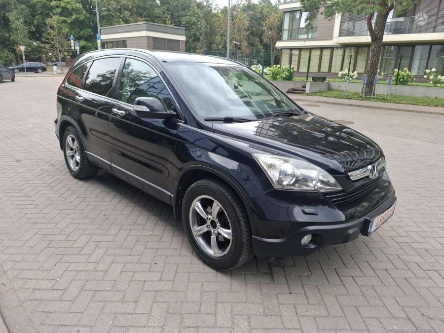 Black Honda CR-V 2007 in Vilnius, with an engine capacity of 2.00 L and mileage of 248 thousand km for 4800 €, photo 4 on AUTOMOTO.COM.LV