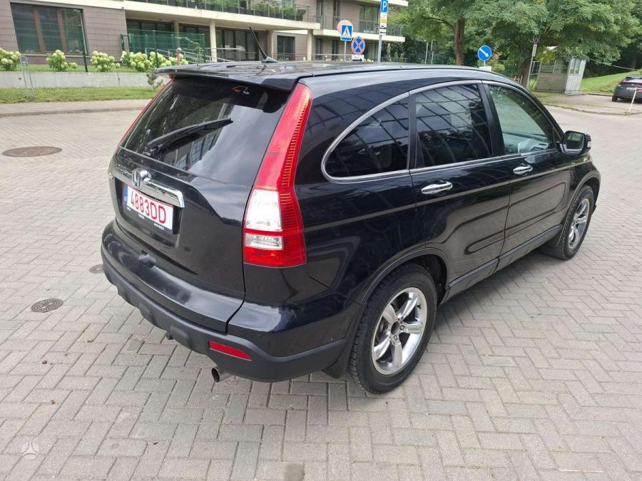Black Honda CR-V 2007 in Vilnius, with an engine capacity of 2.00 L and mileage of 248 thousand km for 4800 €, photo 6 on AUTOMOTO.COM.LV