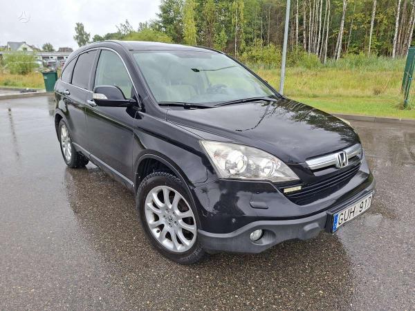 Black Honda CR-V 2007 in Utena, with an engine capacity of 2.20 L and mileage of 370 thousand km for 2450 €, photo 3 on AUTOMOTO.COM.LV
