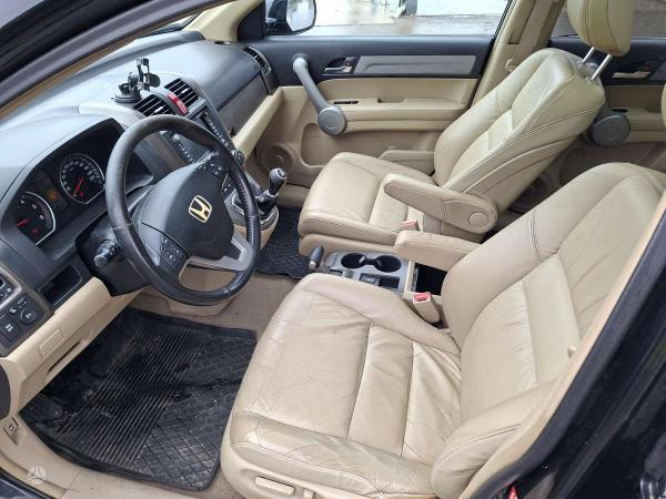 Black Honda CR-V 2007 in Utena, with an engine capacity of 2.20 L and mileage of 370 thousand km for 2450 €, photo 10 on AUTOMOTO.COM.LV