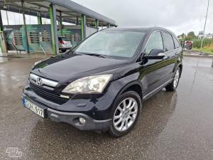 Melns Honda CR-V 2007 Utena, ar dzinēja tilpumu 2.20 L un nobraukumu 370 tūkst. km par 2450 €, foto  vietnē AUTOMOTO.COM.LV