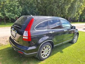 Black Honda CR-V 2007 in Siauliai, with an engine capacity of 2.20 L and mileage of 334 thousand km for 5500 €, photo 4 on AUTOMOTO.COM.LV