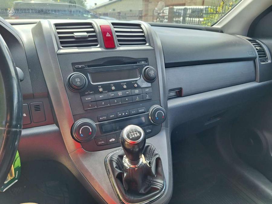 Black Honda CR-V 2007 in Siauliai, with an engine capacity of 2.20 L and mileage of 334 thousand km for 5500 €, photo 8 on AUTOMOTO.COM.LV