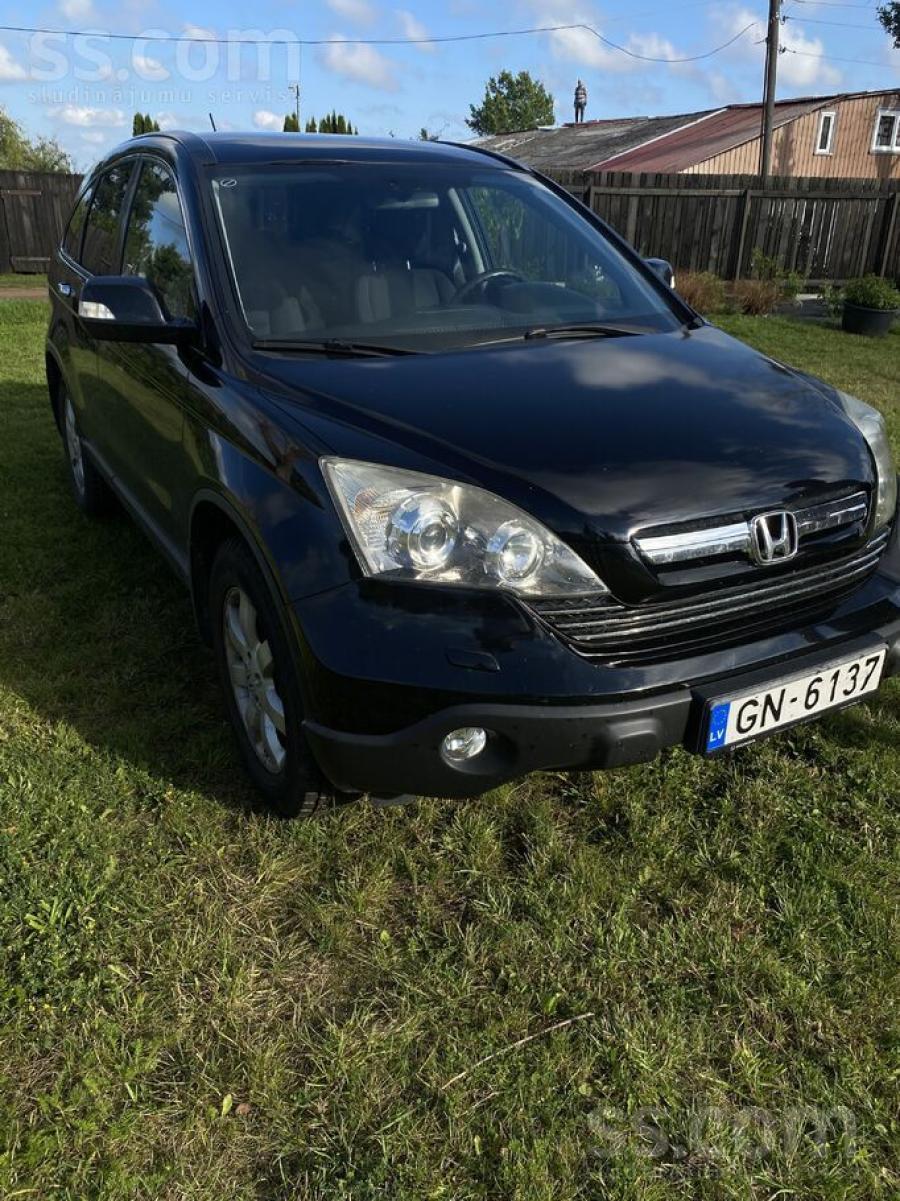Black Honda CR-V 2007 in Liepaja, with an engine capacity of 2.00 L and mileage of 190 thousand km for 3500 €, photo 1 on AUTOMOTO.COM.LV