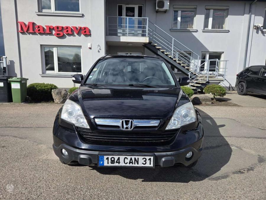 Black Honda CR-V 2007 in Marijampole, with an engine capacity of 2.20 L and mileage of 270 thousand km for 4699 €, photo 3 on AUTOMOTO.COM.LV