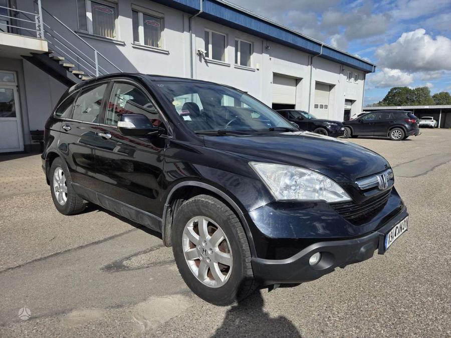 Black Honda CR-V 2007 in Marijampole, with an engine capacity of 2.20 L and mileage of 270 thousand km for 4699 €, photo 4 on AUTOMOTO.COM.LV