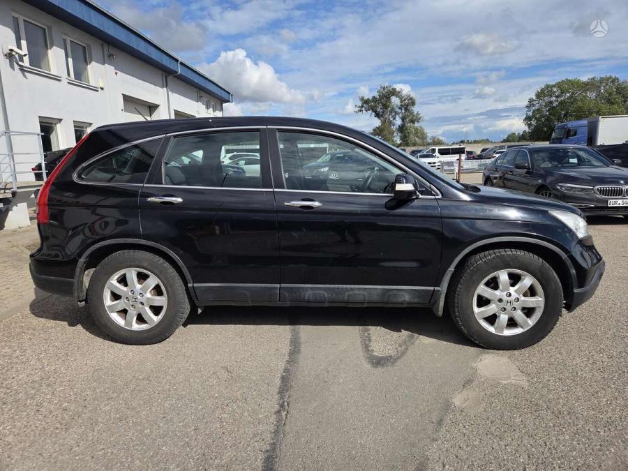 Black Honda CR-V 2007 in Marijampole, with an engine capacity of 2.20 L and mileage of 270 thousand km for 4699 €, photo 5 on AUTOMOTO.COM.LV