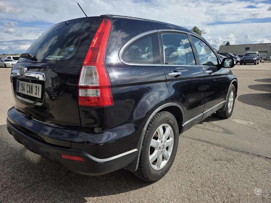 Black Honda CR-V 2007 in Marijampole, with an engine capacity of 2.20 L and mileage of 270 thousand km for 4699 €, photo 6 on AUTOMOTO.COM.LV