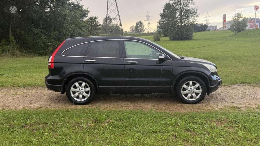Black Honda CR-V 2007 in Vilnius, with an engine capacity of 2.00 L and mileage of 420 thousand km for 2450 €, photo 7 on AUTOMOTO.COM.LV