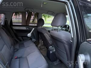 Melns Honda CR-V 2007 Liepāja, ar dzinēja tilpumu 2.20 L un nobraukumu 302 tūkst. km par 4700 €, foto 15 vietnē AUTOMOTO.COM.LV