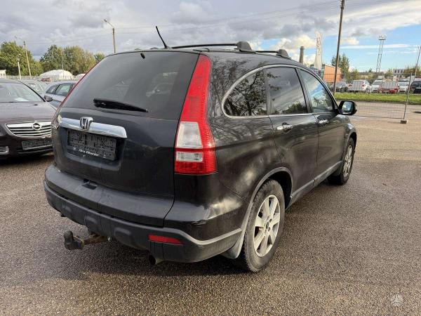 Black Honda CR-V 2007 in Marijampole, with an engine capacity of 2.00 L and mileage of 274 thousand km for 3650 €, photo 6 on AUTOMOTO.COM.LV