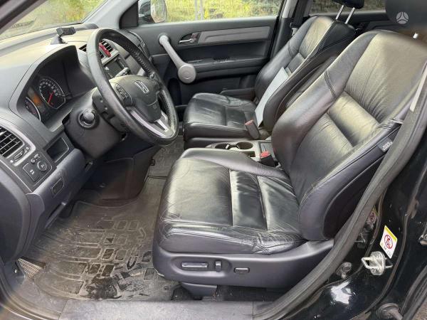 Black Honda CR-V 2007 in Marijampole, with an engine capacity of 2.00 L and mileage of 274 thousand km for 3650 €, photo 11 on AUTOMOTO.COM.LV