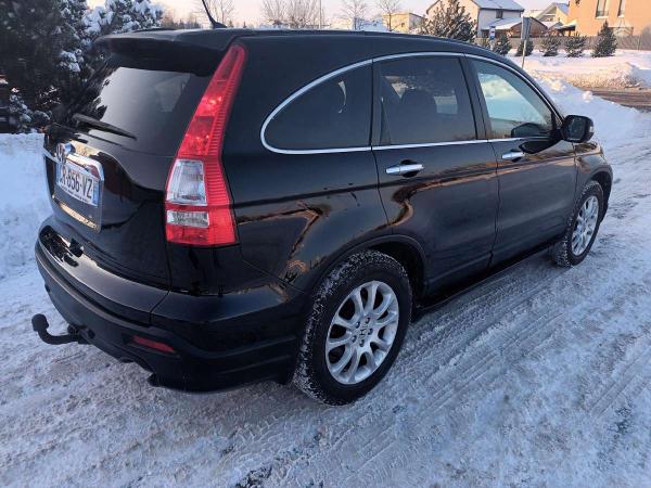 Black Honda CR-V 2008 in Panevezys, with an engine capacity of 2.20 L and mileage of 265 thousand km for 4650 €, photo 4 on AUTOMOTO.COM.LV