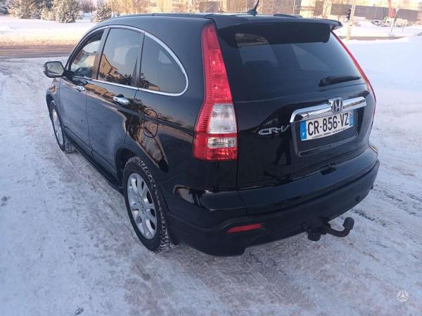 Black Honda CR-V 2008 in Panevezys, with an engine capacity of 2.20 L and mileage of 265 thousand km for 4650 €, photo 5 on AUTOMOTO.COM.LV