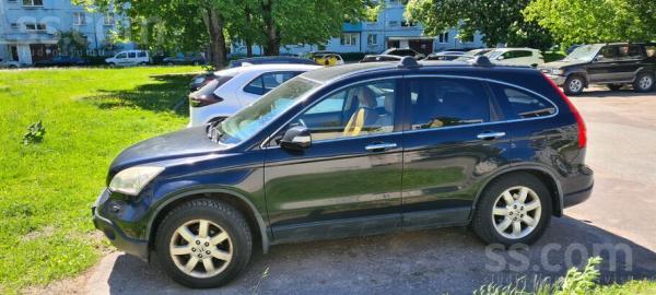 Black Honda CR-V 2008 in Riga, with an engine capacity of 2.20 L and mileage of 304 thousand km for 3500 €, photo 6 on AUTOMOTO.COM.LV
