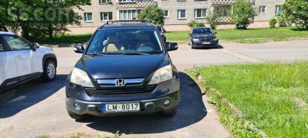 Black Honda CR-V 2008 in Riga, with an engine capacity of 2.20 L and mileage of 304 thousand km for 3500 €, photo 7 on AUTOMOTO.COM.LV