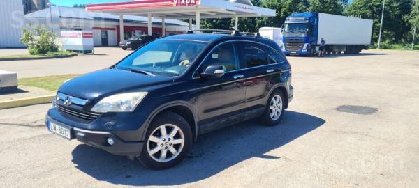 Black Honda CR-V 2008 in Riga, with an engine capacity of 2.20 L and mileage of 304 thousand km for 3100 €, photo 1 on AUTOMOTO.COM.LV