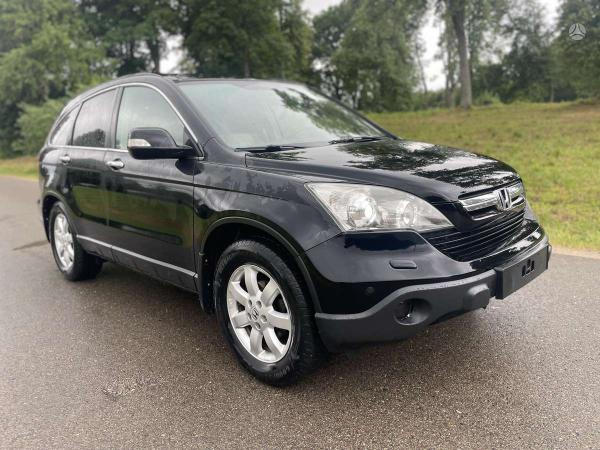 Black Honda CR-V 2008 in Vilnius, with an engine capacity of 2.20 L and mileage of 285 thousand km for 2850 €, photo 7 on AUTOMOTO.COM.LV