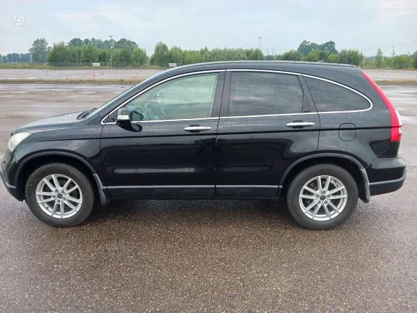 Black Honda CR-V 2008 in Marijampole, with an engine capacity of 2.20 L and mileage of 287 thousand km for 4850 €, photo 4 on AUTOMOTO.COM.LV