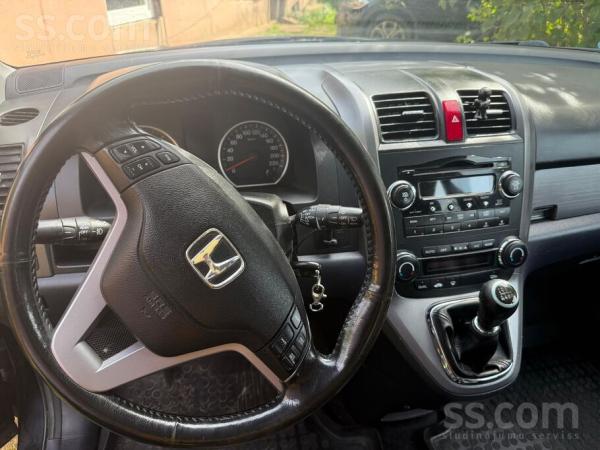 Melns Honda CR-V 2008 Rēzekne, ar dzinēja tilpumu 2.20 L un nobraukumu 284 tūkst. km par 4200 €, foto 4 vietnē AUTOMOTO.COM.LV