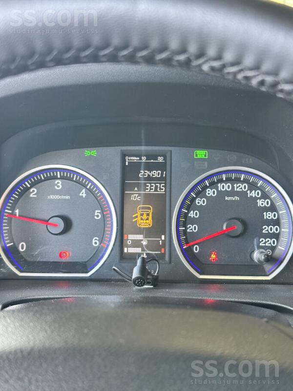 Black Honda CR-V 2009 in Liepaja, with an engine capacity of 2.20 L and mileage of 236 thousand km for 6000 €, photo 6 on AUTOMOTO.COM.LV