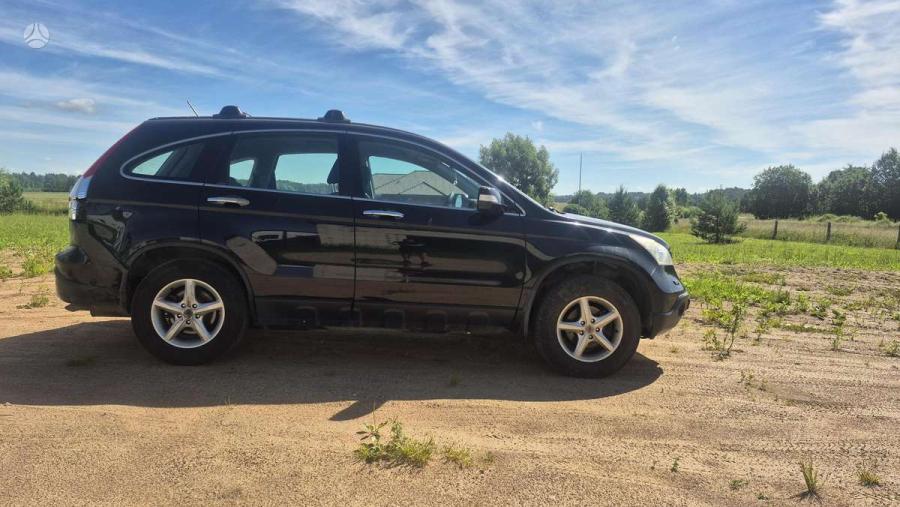 Black Honda CR-V 2009 in Silute, with an engine capacity of 2.20 L and mileage of 33 thousand km for 2450 €, photo 3 on AUTOMOTO.COM.LV