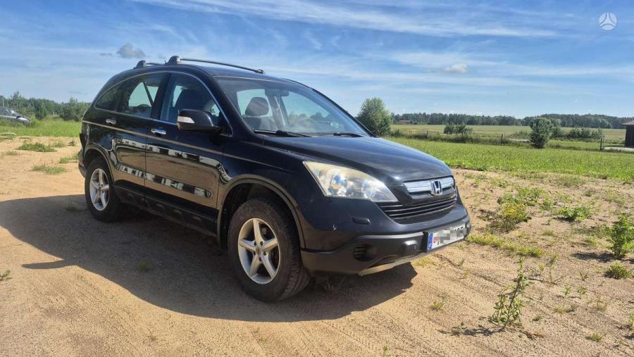 Black Honda CR-V 2009 in Silute, with an engine capacity of 2.20 L and mileage of 33 thousand km for 2450 €, photo 4 on AUTOMOTO.COM.LV