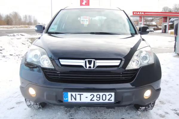 Black Honda CR-V 2009 in Jekabpils, with an engine capacity of 2.20 L and mileage of 255 thousand km for 7200 €, photo 4 on AUTOMOTO.COM.LV