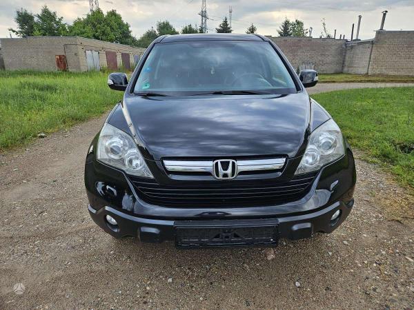 Black Honda CR-V 2009 in Prienai, with an engine capacity of 2.20 L and mileage of 239 thousand km for 5100 €, photo 1 on AUTOMOTO.COM.LV