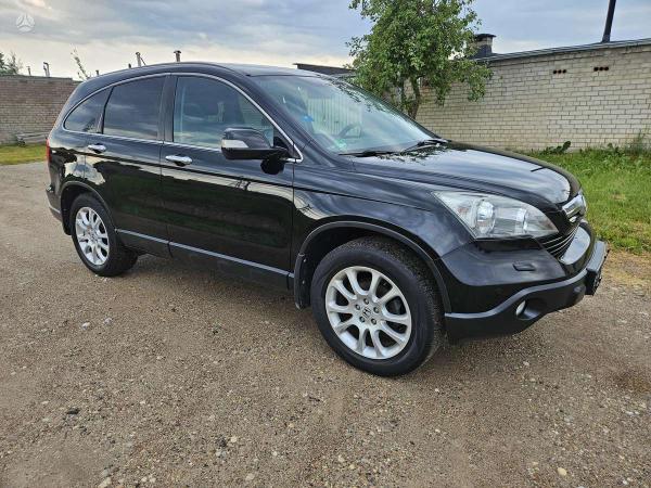 Black Honda CR-V 2009 in Prienai, with an engine capacity of 2.20 L and mileage of 239 thousand km for 5100 €, photo 2 on AUTOMOTO.COM.LV