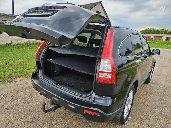 Black Honda CR-V 2009 in Prienai, with an engine capacity of 2.20 L and mileage of 239 thousand km for 5100 €, photo 7 on AUTOMOTO.COM.LV