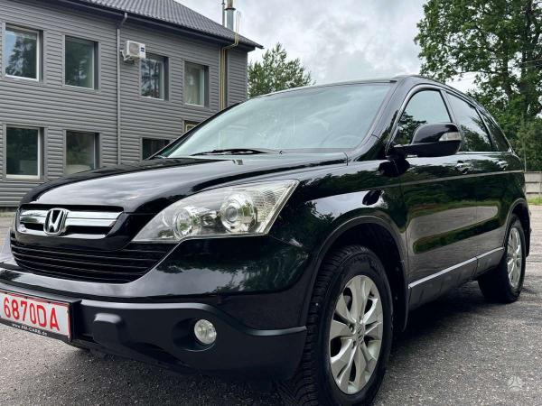 Black Honda CR-V 2009 in Utena, with an engine capacity of 2.20 L and mileage of 302 thousand km for 5750 €, photo 3 on AUTOMOTO.COM.LV
