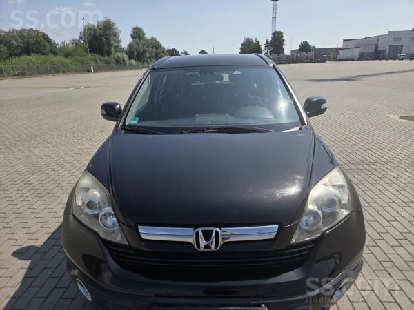 Melns Honda CR-V 2009 Bauska, ar dzinēja tilpumu 2.20 L un nobraukumu 204 tūkst. km par 6590 €, foto 1 vietnē AUTOMOTO.COM.LV