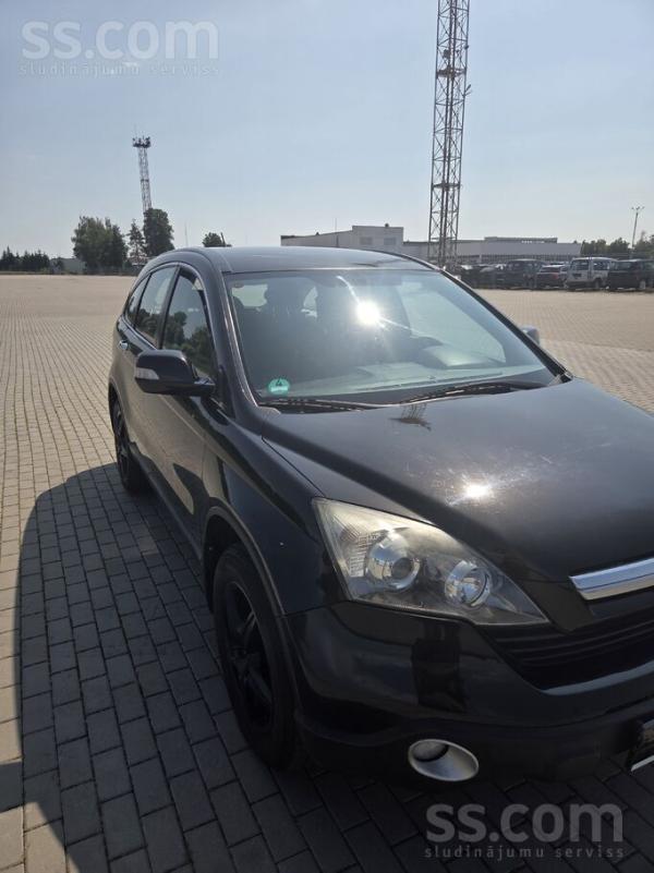 Melns Honda CR-V 2009 Bauska, ar dzinēja tilpumu 2.20 L un nobraukumu 204 tūkst. km par 6590 €, foto 2 vietnē AUTOMOTO.COM.LV