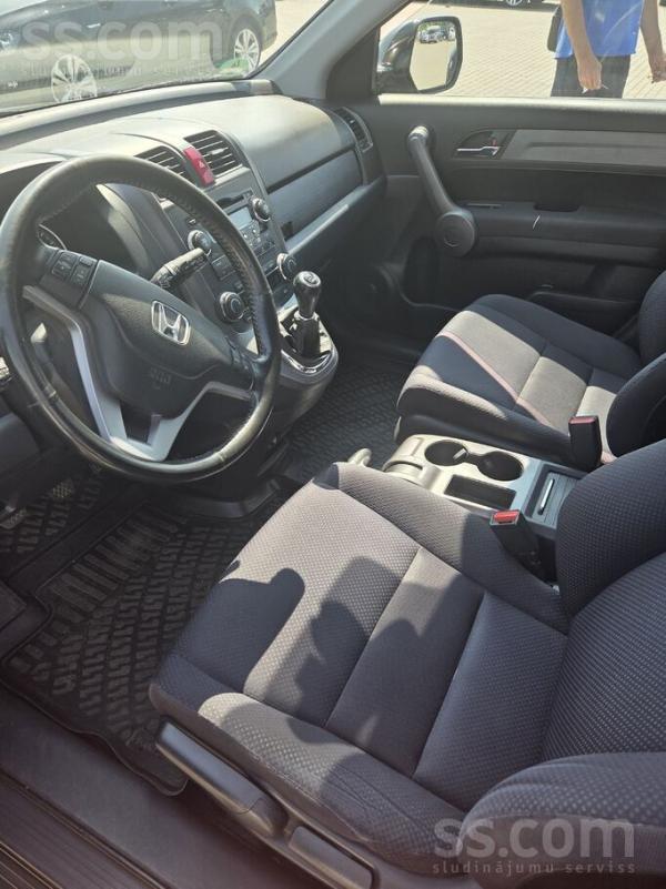 Melns Honda CR-V 2009 Bauska, ar dzinēja tilpumu 2.20 L un nobraukumu 204 tūkst. km par 6590 €, foto 8 vietnē AUTOMOTO.COM.LV