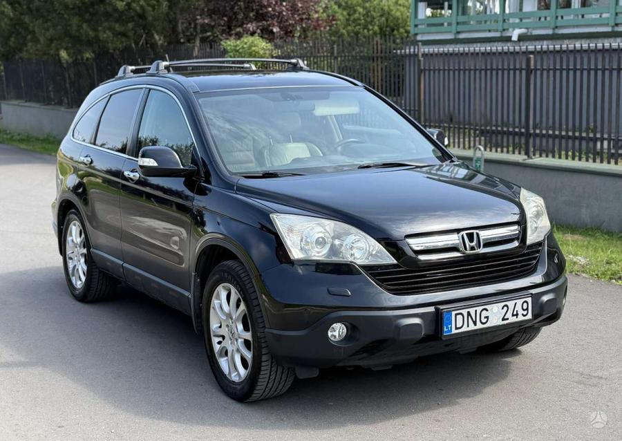 Black Honda CR-V 2009 in Vilnius, with an engine capacity of 2.00 L and mileage of 219 thousand km for 3450 €, photo 6 on AUTOMOTO.COM.LV