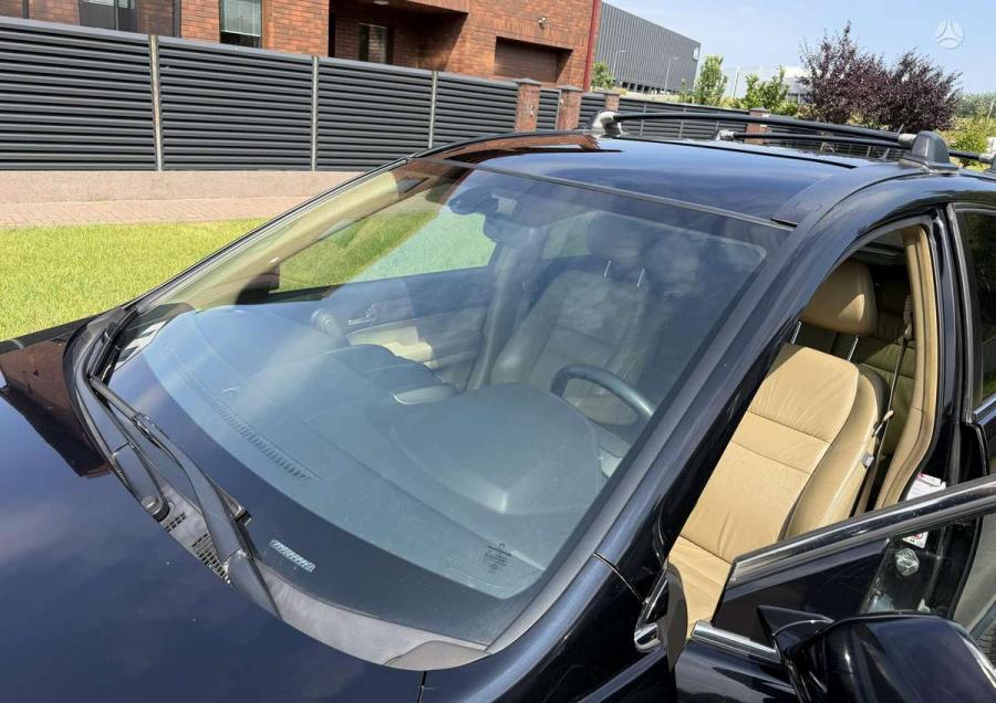 Black Honda CR-V 2009 in Vilnius, with an engine capacity of 2.00 L and mileage of 219 thousand km for 3450 €, photo 8 on AUTOMOTO.COM.LV