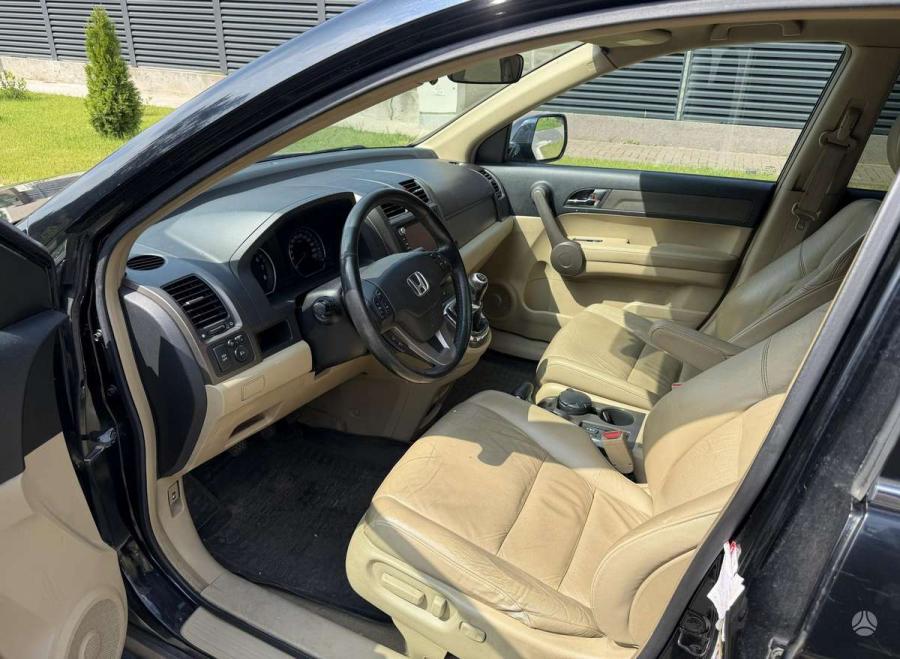 Black Honda CR-V 2009 in Vilnius, with an engine capacity of 2.00 L and mileage of 219 thousand km for 3450 €, photo 9 on AUTOMOTO.COM.LV