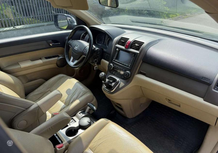 Black Honda CR-V 2009 in Vilnius, with an engine capacity of 2.00 L and mileage of 219 thousand km for 3450 €, photo 19 on AUTOMOTO.COM.LV