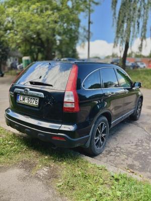 Black Honda CR-V 2009 in Riga, with an engine capacity of 2.20 L and mileage of 297 thousand km for 5300 €, photo 5 on AUTOMOTO.COM.LV