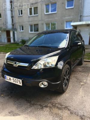 Black Honda CR-V 2009 in Riga, with an engine capacity of 2.20 L and mileage of 297 thousand km for 5300 €, photo 6 on AUTOMOTO.COM.LV