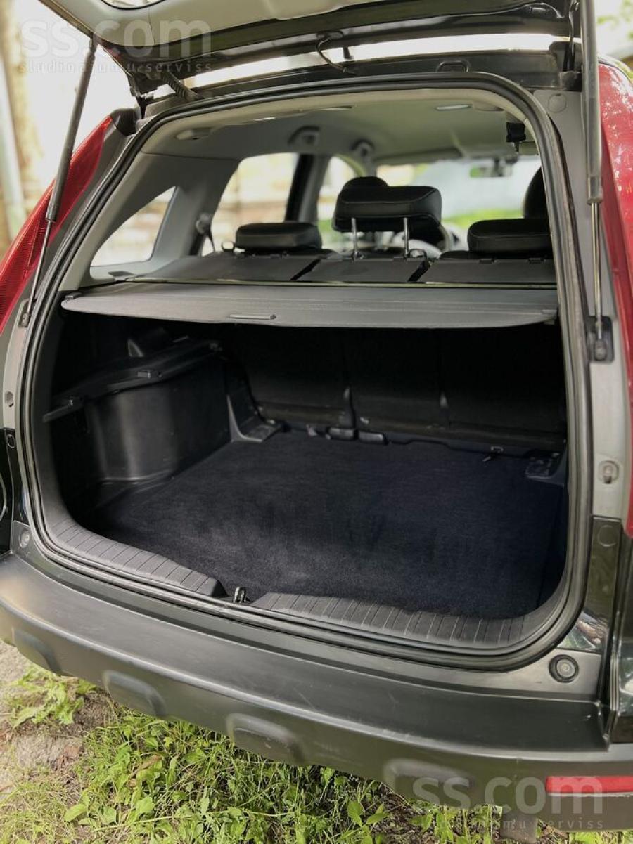Black Honda CR-V 2009 in Riga, with an engine capacity of 2.20 L and mileage of 297 thousand km for 5300 €, photo 8 on AUTOMOTO.COM.LV