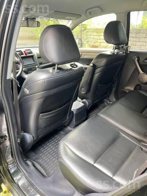 Black Honda CR-V 2009 in Riga, with an engine capacity of 2.20 L and mileage of 297 thousand km for 5300 €, photo 10 on AUTOMOTO.COM.LV