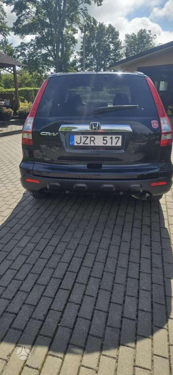 Black Honda CR-V 2009 in Utena, with an engine capacity of 2.20 L and mileage of 274 thousand km for 4900 €, photo 5 on AUTOMOTO.COM.LV