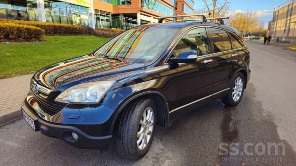 Black Honda CR-V 2010 in Riga, with an engine capacity of 2.20 L and mileage of 320 thousand km for 6000 €, photo 5 on AUTOMOTO.COM.LV