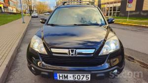 Black Honda CR-V 2010 in Riga, with an engine capacity of 2.20 L and mileage of 320 thousand km for 6000 €, photo 6 on AUTOMOTO.COM.LV