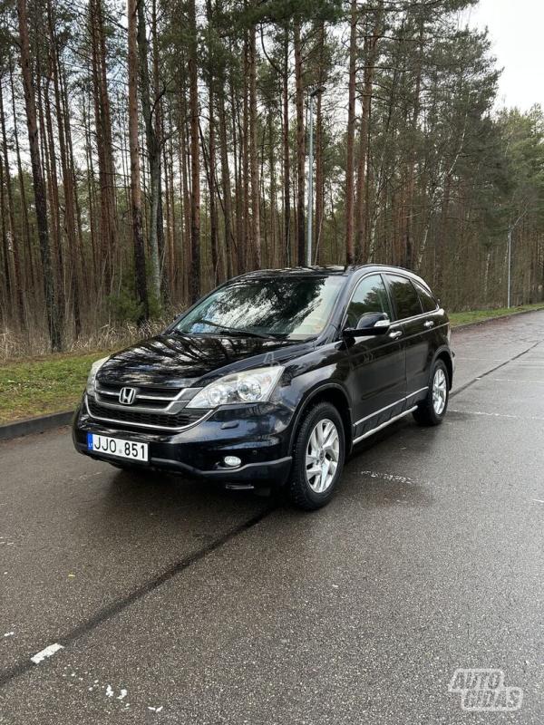 Black Honda CR-V 2010 in Visaginas, with an engine capacity of 2.20 L and mileage of 200 thousand km for 5500 €, photo 1 on AUTOMOTO.COM.LV